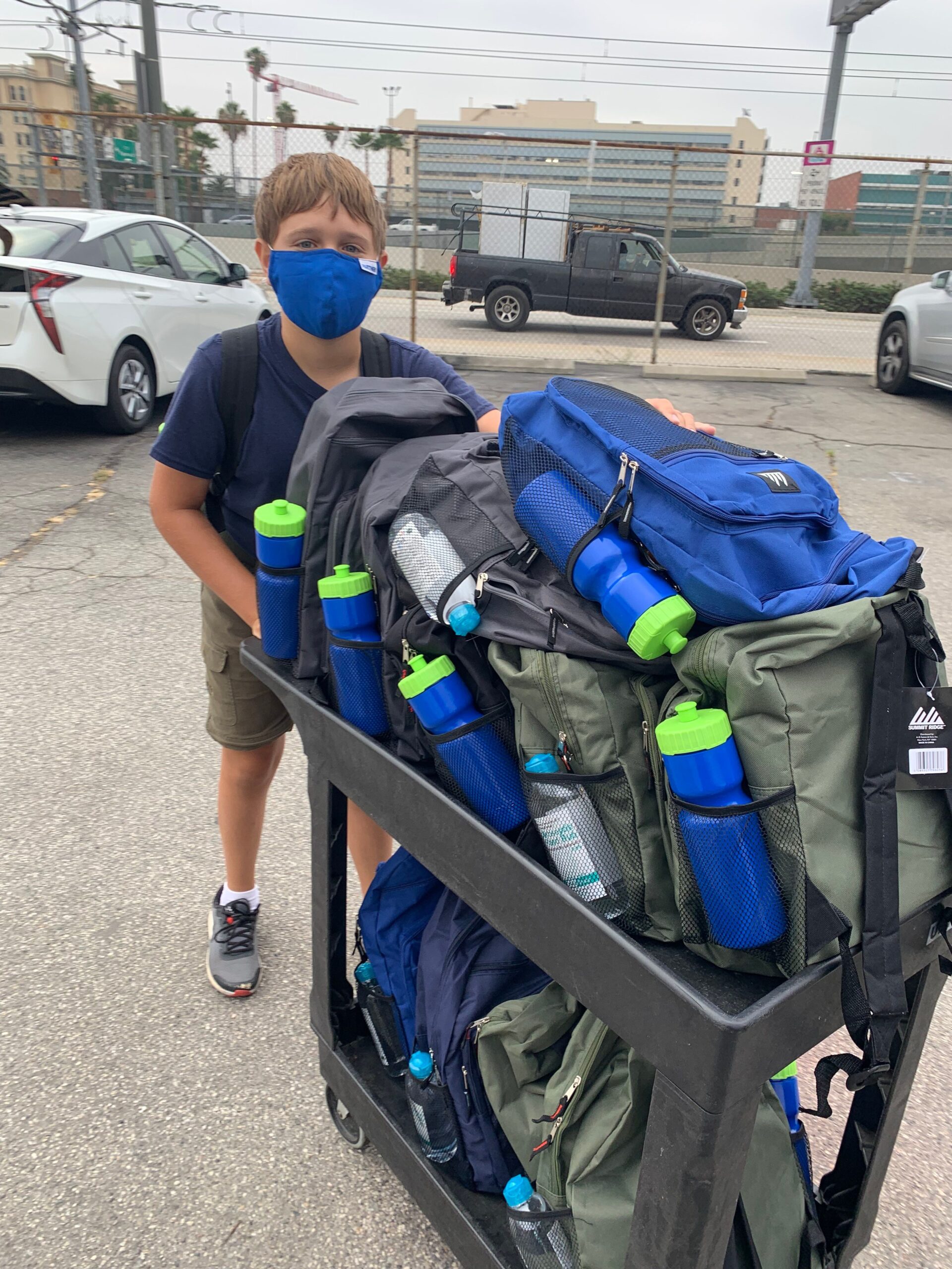 Troop 223 Scouts Help Distribute Backpacks | Circling The News
